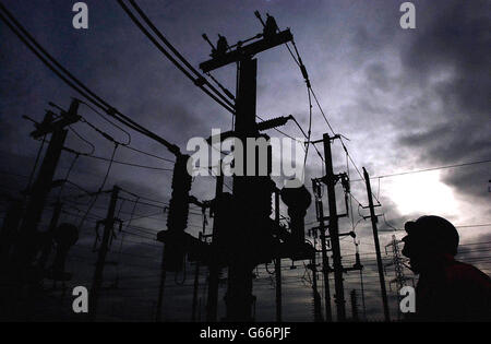 Overhead feeder power line on pole with fuse cutout switch for ...