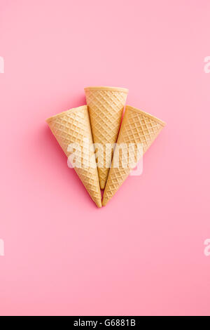 Overhead view of tasty waffle cones with creamy meringue milk gelato ...