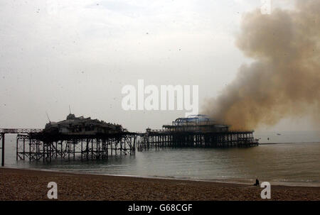 Smoke billows from Brighton s West Pier after fire broke out. The fire ...