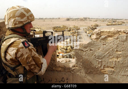 A security guard looks out near an opening ceremony ahead of Dragon ...