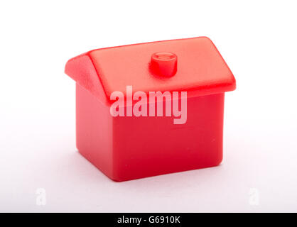 red monopoly hotel on white background Stock Photo - Alamy