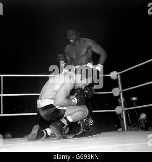 World Champion Emile Griffith (l) from America puts Great Britain's ...