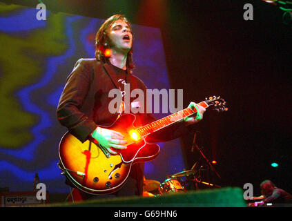 Supergrass lead singer on stage at Irvine beach pop concert Gaz Coombes ...