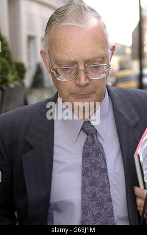 Dr Charles Gould, 69, a General Practioner from Belfast, leaves the ...