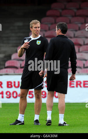 Burnley's Head of Sports Science Mark Howard oversees the warm up Stock ...