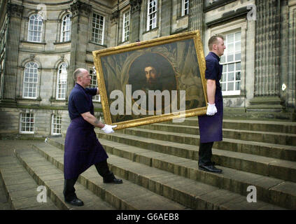 Sotheby's technicians Brian Lamont and Scott Riddell carry one of the ...