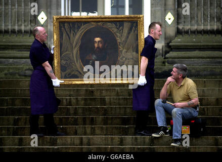 Sotheby's technicians Brian Lamont and Scott Riddell carry one of the ...