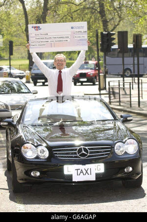 Taxi driver Bob Frazer, from Heaton, Newcastle, celebrates after ...