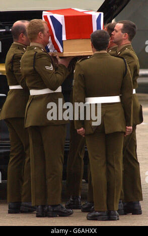 The coffin of 24-year-old Sapper Luke Allsopp is carried from an RAF ...