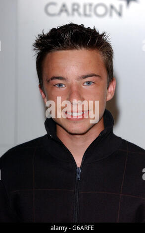 Seb Clover, who sailed the Atlantic alone, poses with his Inspiration ...