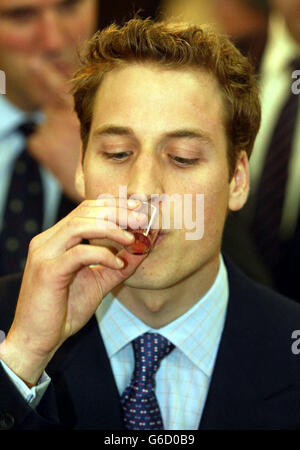 Prince William samples a liqueur, during a visit to the Anglesey Food ...