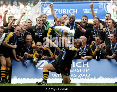 Wasps Trevor Leota lifts the trophy infront of his team mates after ...