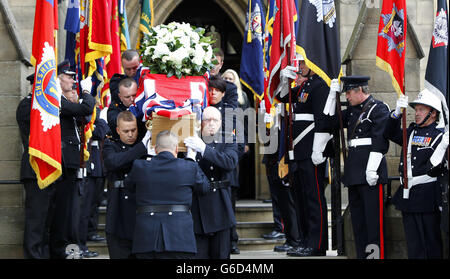 A coffin is carried out during the funeral of Samuel Puttick, 5, and ...