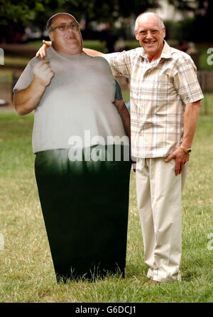 Malcolm Bird, 59, from Suffolk, who now weighs 14st 6lbs, posses in his ...