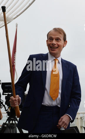 Labour Leader Ed Miliband waves to miners as they head towards the ...