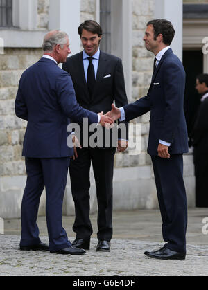 The Prince of Wales greets William van Cutsem with his brother Hugh ...