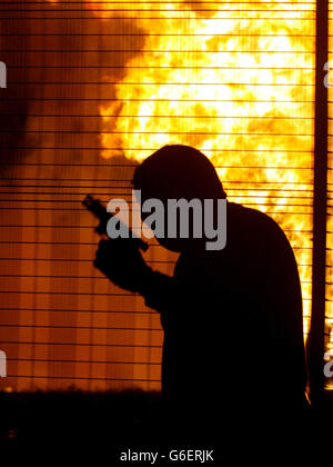 An Ulster Volunteer Force (UVF) gunman fires a volley of shots in the ...