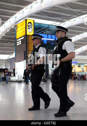 Armed police during one of their routine patrols of Terminal 5 ...
