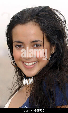 Model Angela Grant poses for photographers on Brighton beach, during a ...