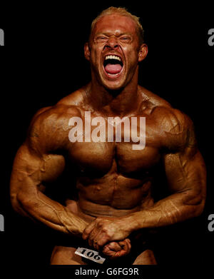 Competitor Dan O'Brien takes part in the NABBA Mr. Ireland 2013 Pro Am ...