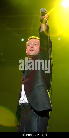 Lead Singer of the band Blur Damon Albarn eating an orange at the Music ...