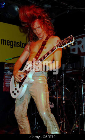 Justin Hawkins of The Darkness performing during the concert ...