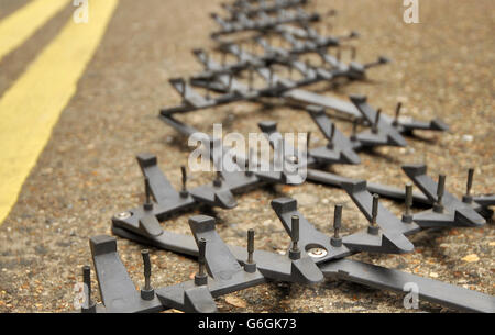 General view of a Police Stinger Spike Strip deployed on a road Stock ...