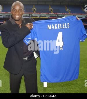 Claude Makelele with his new Chelsea shirt at the club's Stamford ...