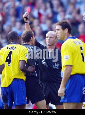 Arsenal's Martin Keown is shown the red card by referee Mike Riley ...