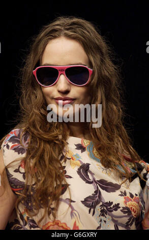 A model wears a creation by designers Gharani Strok during their spring ...