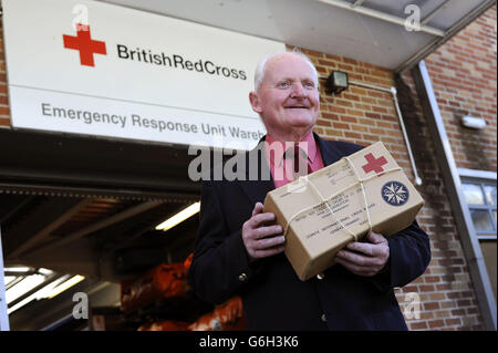 A replica WW2 Red Cross food parcel alongside a modern day equivalent ...