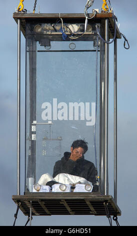David blaine in a box near tower bridge London Stock Photo - Alamy