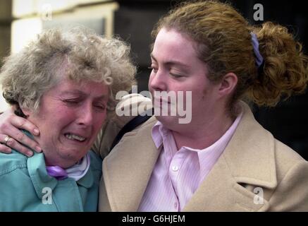 The mother of Thomas McKendrick, Sandra French (L) accompanied by her ...