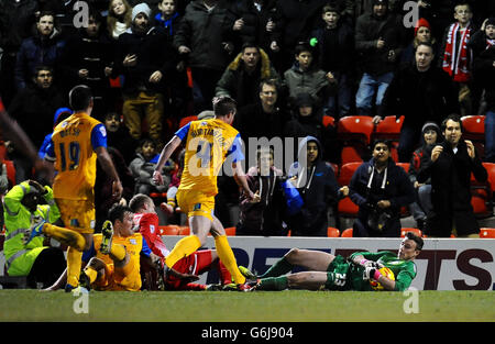 Preston North End's Declan Rudd makes a save during the pre-season ...