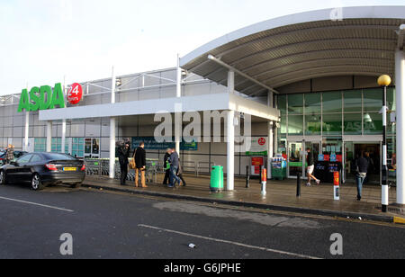 Shoppers leave the Westwood Asda store, in west Belfast where a woman ...