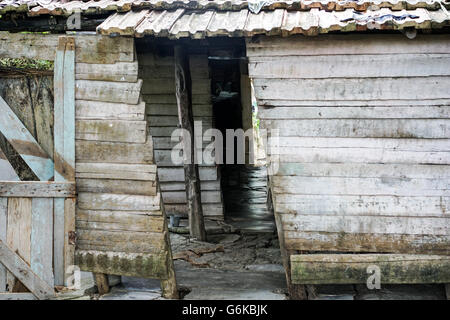 Miserable shack, house. Worn and dilapidated wooden shed. poor housing ...