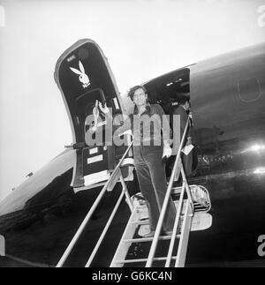 Playboy Editor and Publisher Hugh Hefner arrives at Heathrow Airport in ...