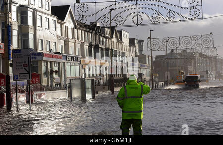 Blackpool Main Promenade under flood water following high tide and a ...