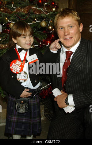 England's Rugby World Cup winner, Josh Lewsey, gives John Lyons, 11, a ...