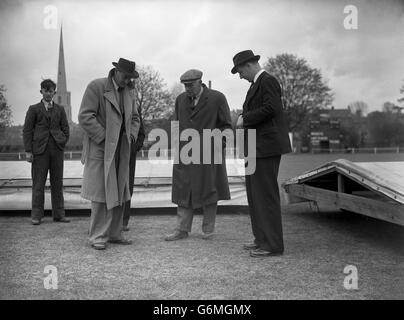 South Africa captain Alan Melville (l) inspects the pitch with ...