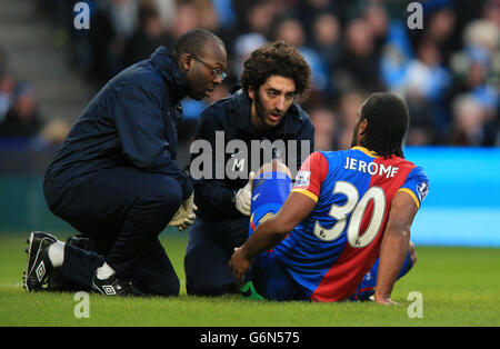 Crystal Palace's Cameron Jerome is treated for an injury before being ...