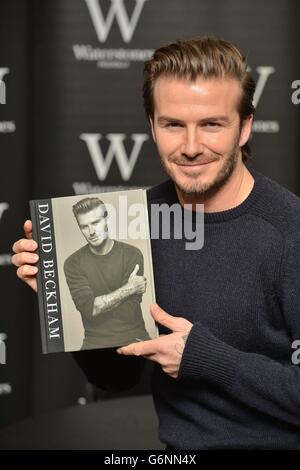 Footballer David Beckham with a copy of his new self titled book, ahead ...