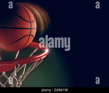 Basketball shot going in net Stock Photo - Alamy