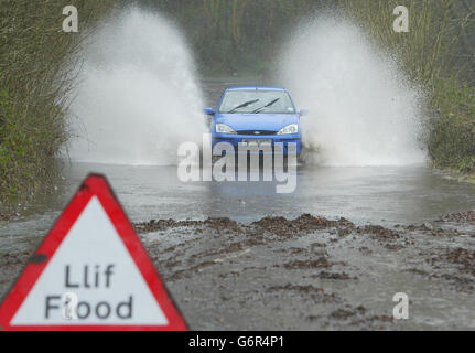 A car drives through flood water on the Bay Estate in Dundalk, Co Louth ...