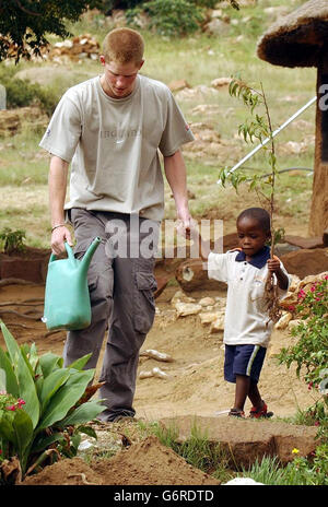 Prince Harry, the younger son of Britain's Prince Charles, with young ...