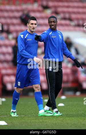 Birmingham City's Tyler Blackett (right) warms up alongside teammate ...