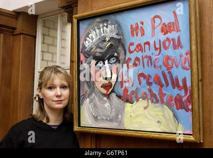 Artist Stella Vine poses next to her portrait of Princess Diana ...