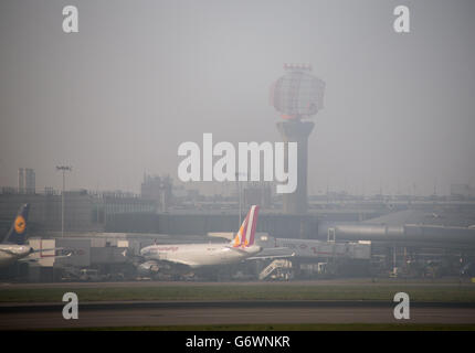 Planes on the apron at Heathrow Airport, as number of flights across ...