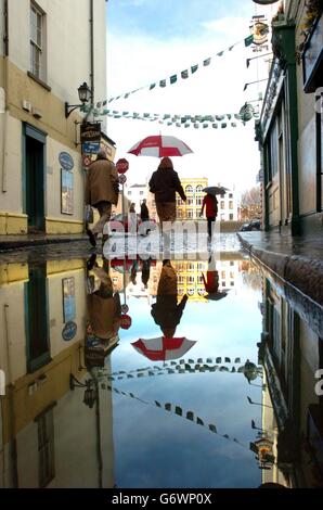 Umbrellas raised in heavy rain at Tooting's celebration of Divali ...
