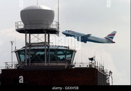 A British Airways passes the New Control Tower at Heathrow Airport it ...
